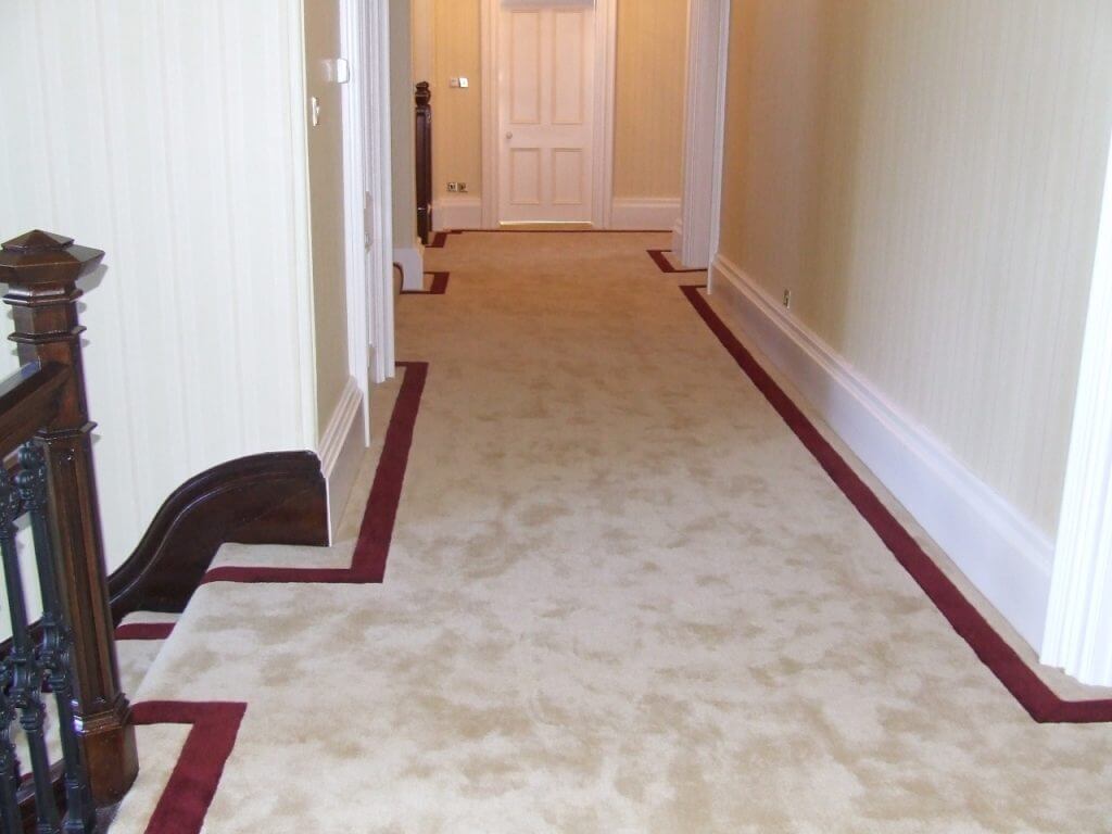 Quality Carpets for Homeowners – Border carpet in deep pile luxury wool.